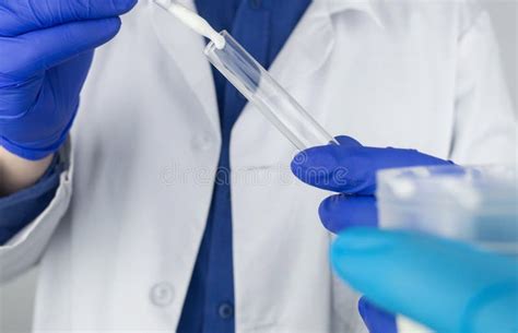 Medical Laboratory Assistant Checks A Test Tube With Sperm Spermogram