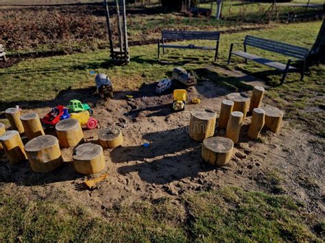 Low Palisade Of Logs In The Sandbox Delimiting The Playing Area On The Field From The Stock