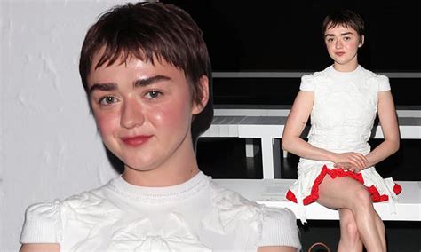 Maisie Williams Puts On A Leggy Display In A Textured White Minidress As She Sits Front Row At
