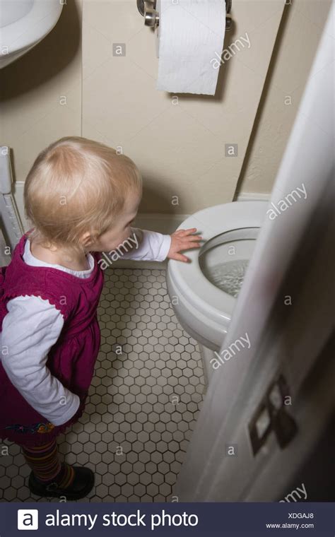 Young Girl Sit On Toilet Stock Footage Video 100