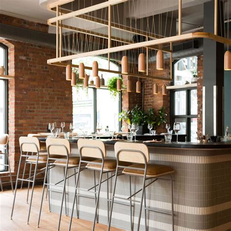 Vintage Objects Populate Restaurant In Charleston By Basic Projects