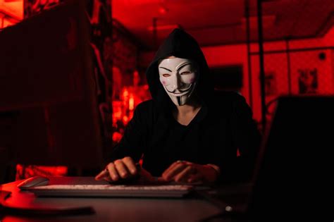 premium photo portrait of dangerous unrecognizable hacker man wearing