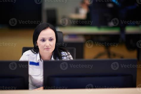 Female Operator Working In A Security Data System Control Room 10829022 Stock Photo At Vecteezy