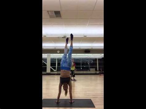 Handstand pirouette to a middle split (gymnastics) - YouTube