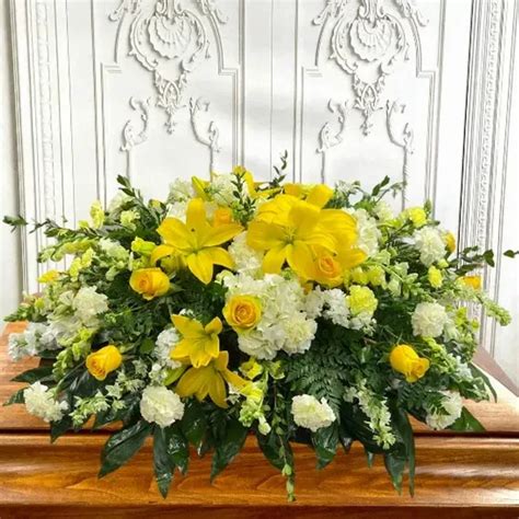 Heavens Light Casket Spray