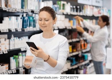 Woman Shopper Scanning Barcode On Cosmetics Stock Photo Shutterstock