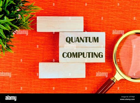 a display focuses on quantum computing featuring wooden blocks