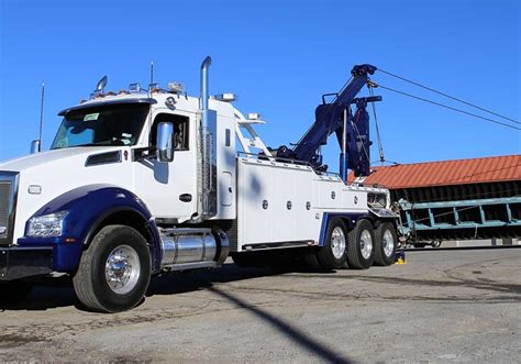 Wrecker Tow Trucks Expertly Handling Vehicle Recovery Tow Crane