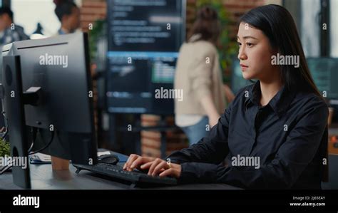 Programer Writing Algorithm Focused On Compiling Source Code Sitting At