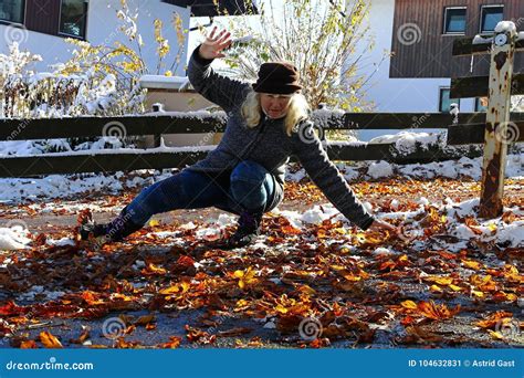 Risk Of Slipping In Autumn And Winter A Woman Slipped On Wet Smooth