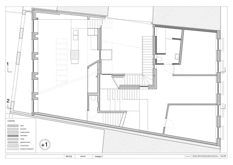 Gewad Apartments By Atelier Vens Vanbelle Feature A Mirrored Atrium