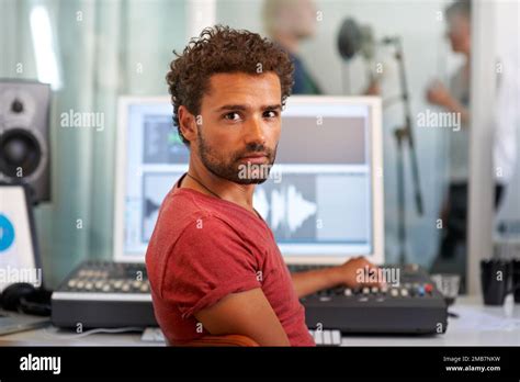 Taking Time To Perfect The Recordinga Handsome Young Sound Engineer
