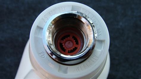 how to remove flow restrictor from delta showerhead storables