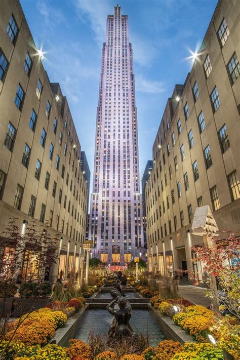 Illuminated Rockefeller Plaza Decorated For Fall With A Tower In The