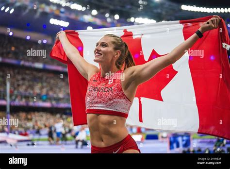 Alysha Newman Celebrating Her Medal With Her Countrys Flag At The