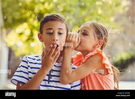 Girl Whispering In Babe S Ear Hi Res Stock Photography And Images Alamy