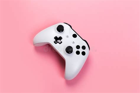 White Joystick Gamepad Game Console On Pink And Blue Background Computer Gaming Technology