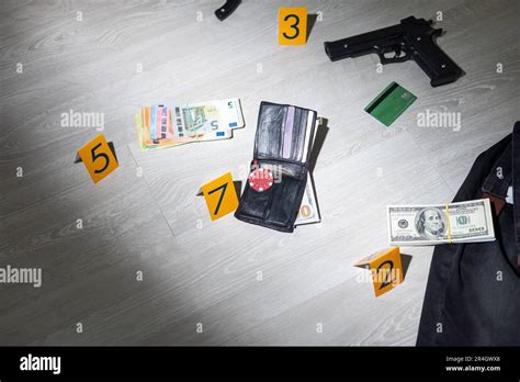 Flat Lay Composition With Evidences And Crime Scene Markers On Wooden