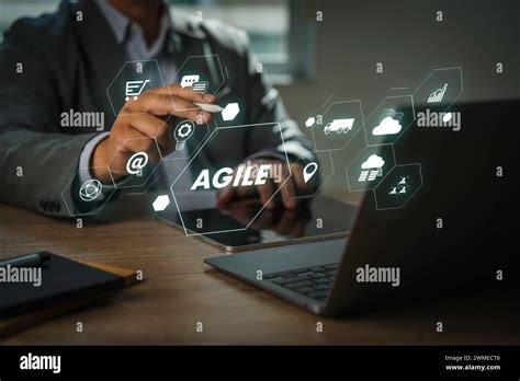 A Businessman Using A Laptop Computer Agile Management And The