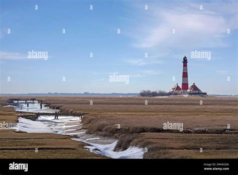 Westerheversand Lighthouse In Westerhever Salt Marshes Wadden Sea