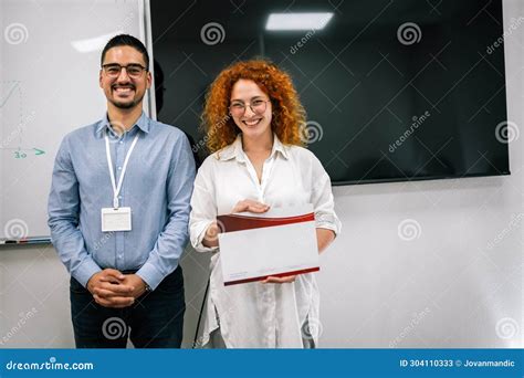 Teachers Teaching Young Students A Programming Class In The Classroom