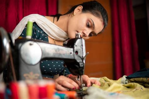Premium Photo Man Using Sewing Machine