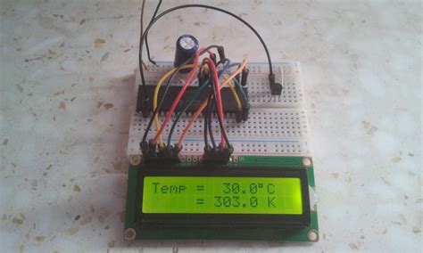 interfacing pic16f887 with lm335 temperature sensor ccs c compiler