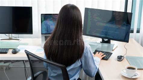 Asian Woman Programmer Typing Source Code With Computer Pc For