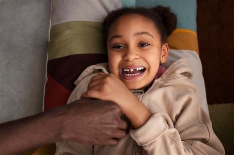 Free Photo Top View Girl Being Tickled