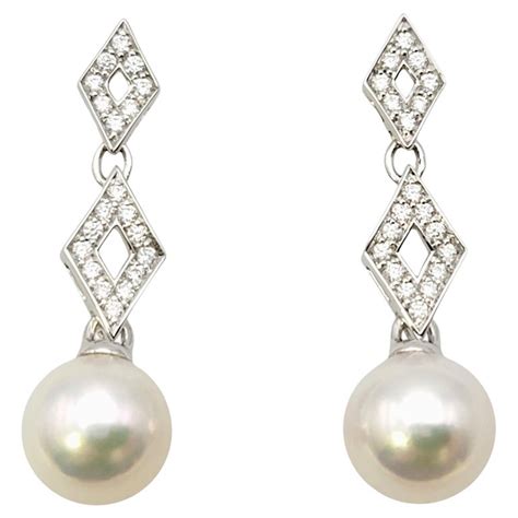 Mikimoto Cultured Pearl And Diamond Dangle Pierced Earrings 18 Karat