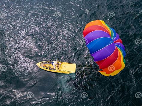 Drone Video Of A Colorful Parasail Soaring Over The Open Ocean Towed