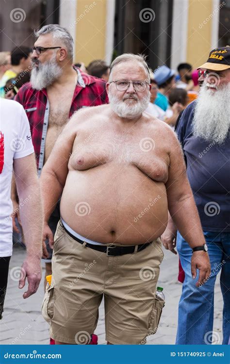 An Obese Hairy Older Man Attending The Gay Pride Parade Also Known As Christopher Street Day CSD