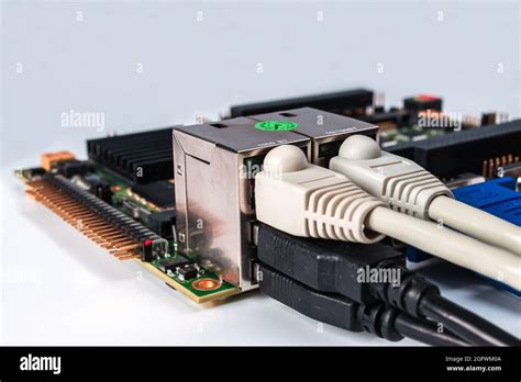 Embedded Cpu Board With Attached Interface Cables On White Background Stock Photo Alamy