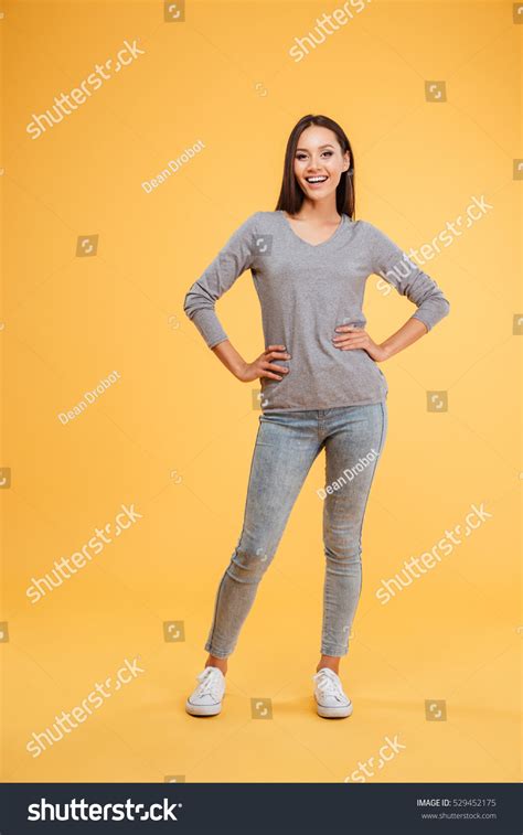 Girl Standing Hands On Hips Images Stock Photos Vectors Shutterstock