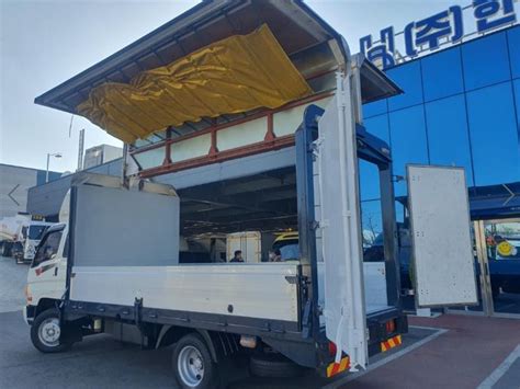 중고 1톤윙바디 현대 E마이티 전중딜화물차