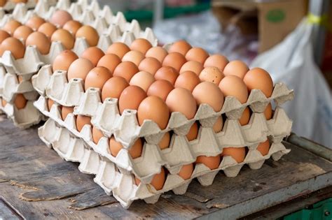 Premium Photo Fresh Eggs In A Three Layer Stacked Panel