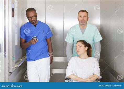 Doctor Nurse And Patient In Elevator In Hospital Stock Image Image Of