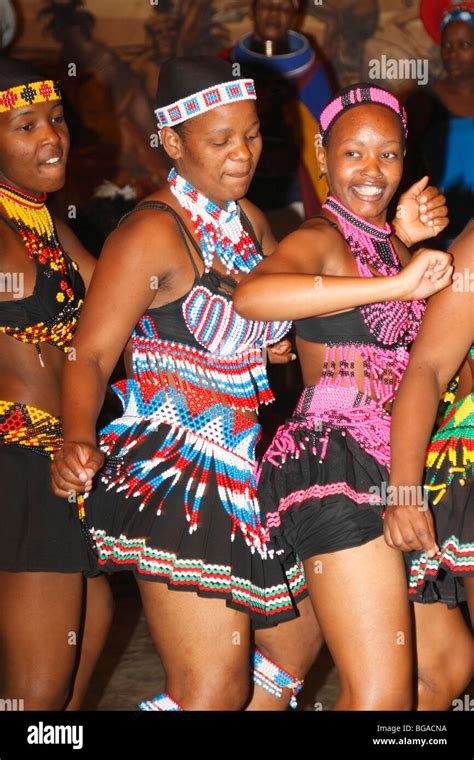 Young Zulu Girls Happily Dancing In Her Traditional Beady Dress Stock