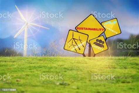 산 배경에 풍력 터빈이 있는 잔디에 노란색 표지판에 쓰여진 환경 사회 및 경제 포부에 대한 스톡 사진 및 기타 이미지 포부 개발 배경 주제 Istock