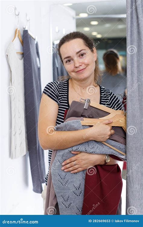 Woman Trying Clothes In Fitting Room Stock Image Image Of Dress