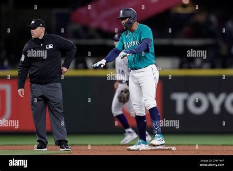 Seattle Mariners Julio Rodriguez Gestures The Safe Sign From Second