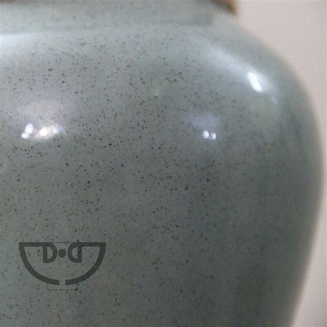 خرید و قیمت گلدان دیواری دکوری سرامیکی با لعاب سبز شفاف و داخل لعاب