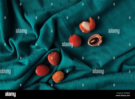 Aesthetic Layout Of Fresh Organic Lychee Litchi Fruit Against Dark