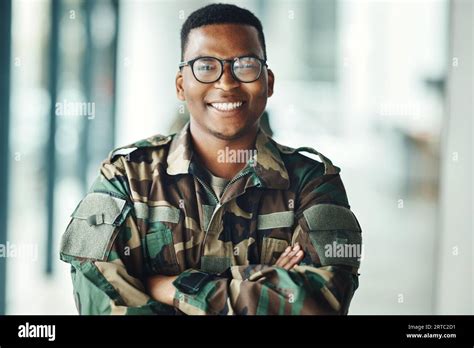 Portrait Of Soldier With Smile Confidence And Pride At Army Building Arms Crossed And Happy