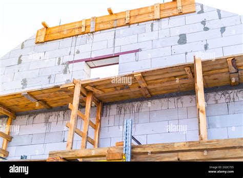 Scaffolding Installed At A Construction Site Building A House From