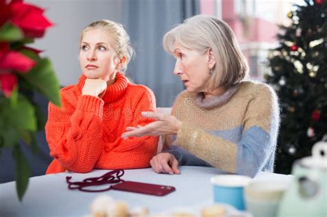 Mature Mother Explains Something To Her Adult Thoughtful Daughter Stock Image Image Of People