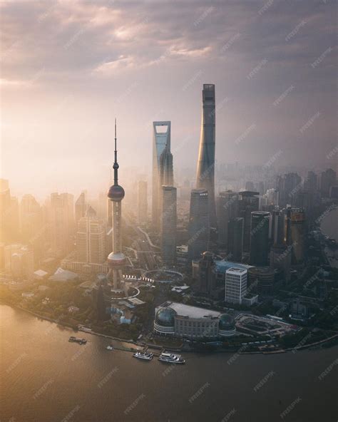 Premium Photo Aerial View Of Modern Buildings In City During Sunset