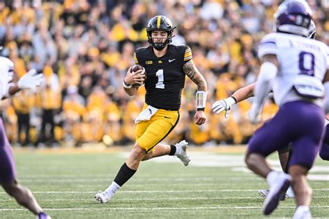 ncaaf news iowa backup qb brendan sullivan in spotlight vs wisconsin