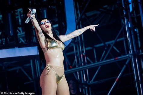 Doja Cat Showcases Her Toned Figure In A Tiny Gold Bikini As She