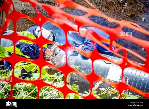 Welders Are In Trench They Arc Welding Pipeline Confined Space With